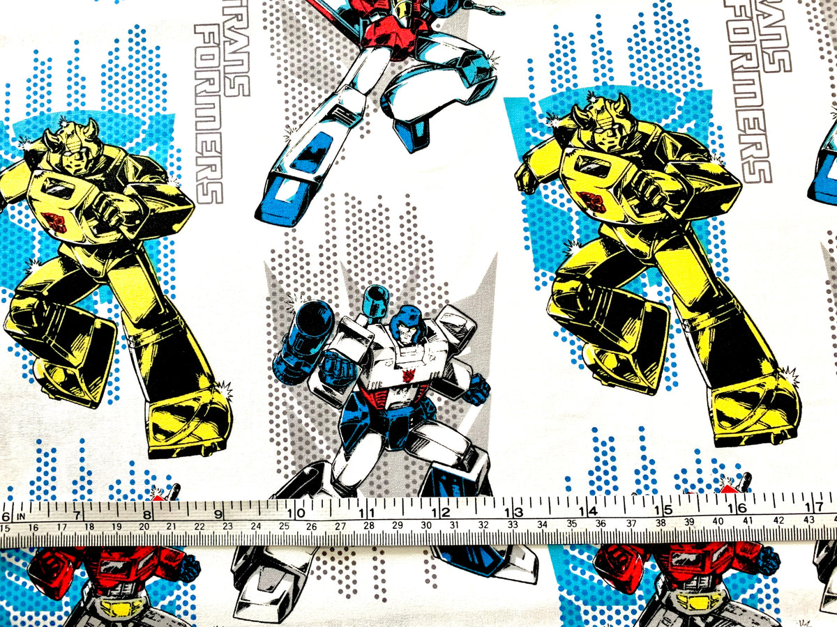 Transformers Logos - White Fabric - 1/2 Meter - Cotton Fabric – Les ...